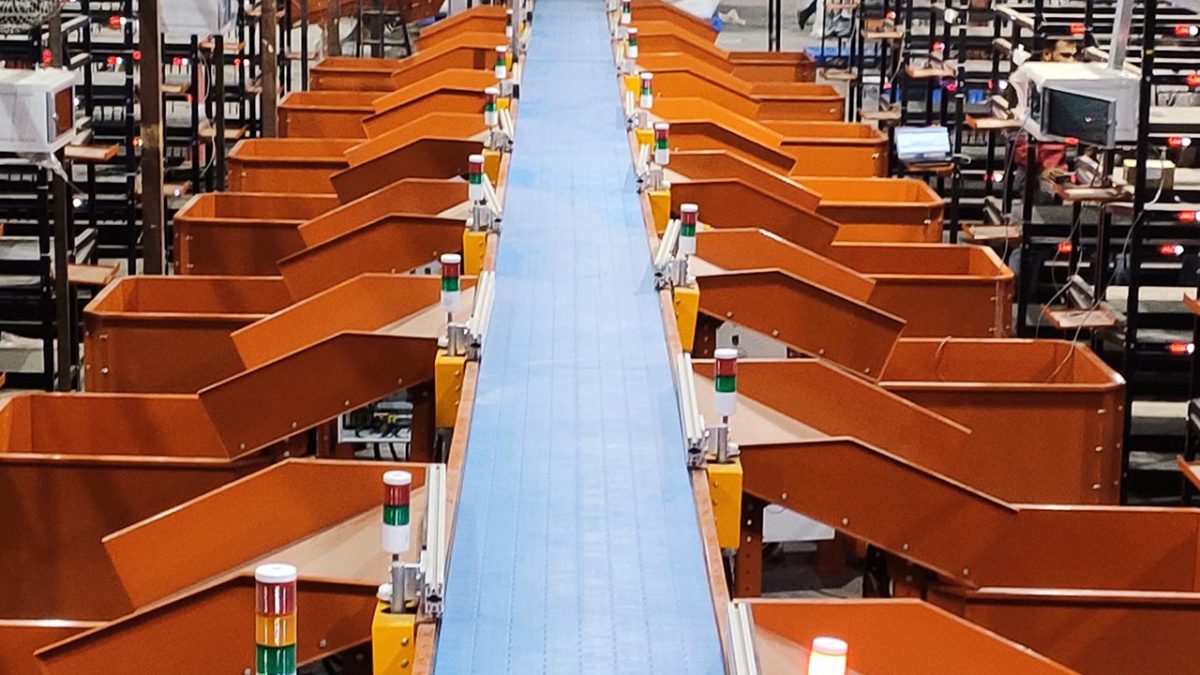 Swing Arm Sorter - Nido Automation