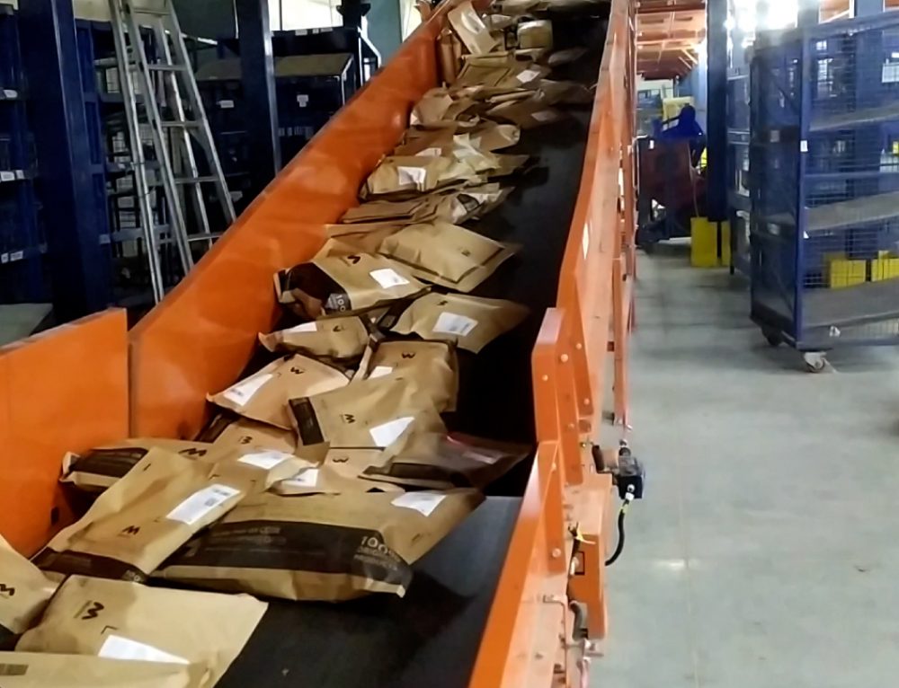 Truck Loading and Unloading Conveyor - Nido Automation