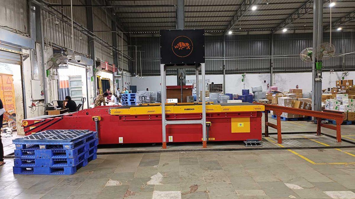 Telescopic Belt Conveyor with Dimensioning & Weighing - Nido Automation