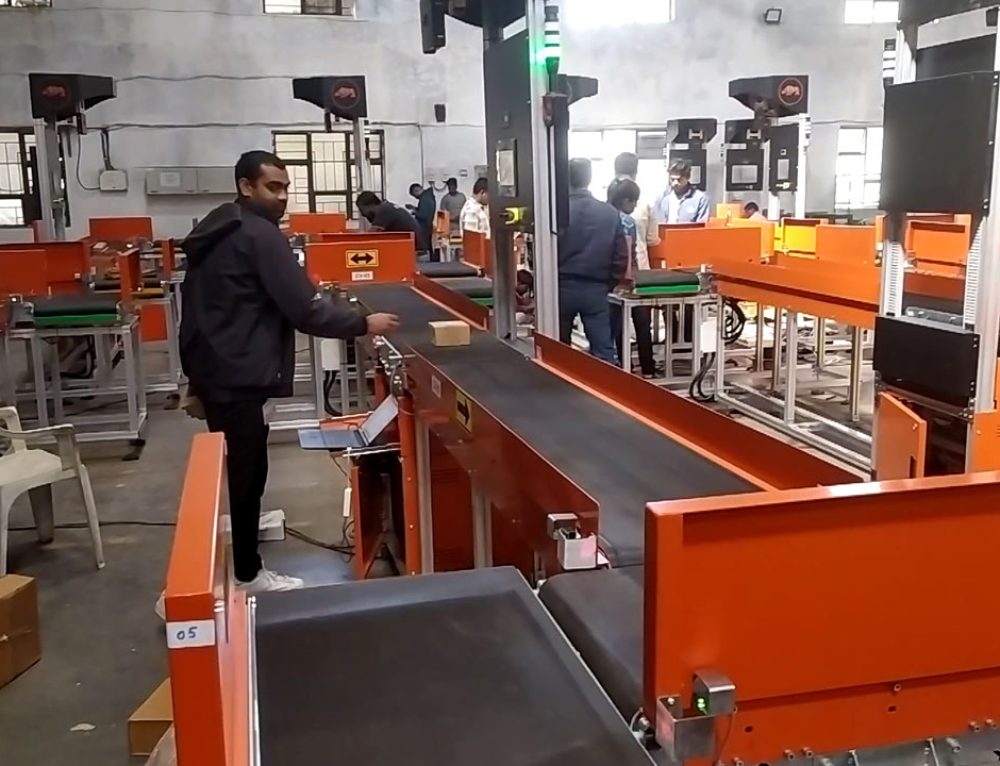 Dual Induct Belt Carriage Sorter with Dimensioning, Weighing & Scanning ...