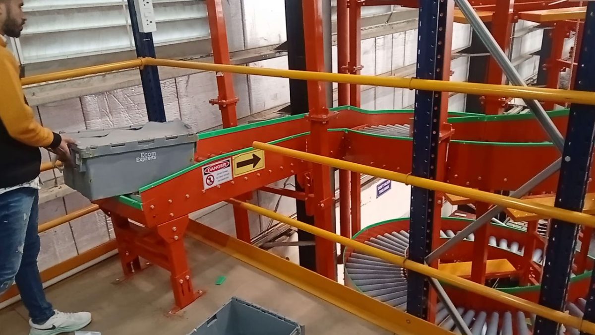 Gravity Spiral Conveyor Handling Totes in Online Food Delivery ...