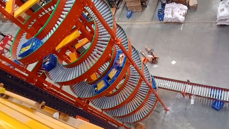 Gravity Spiral Conveyor Handling Totes in Online Food Delivery ...